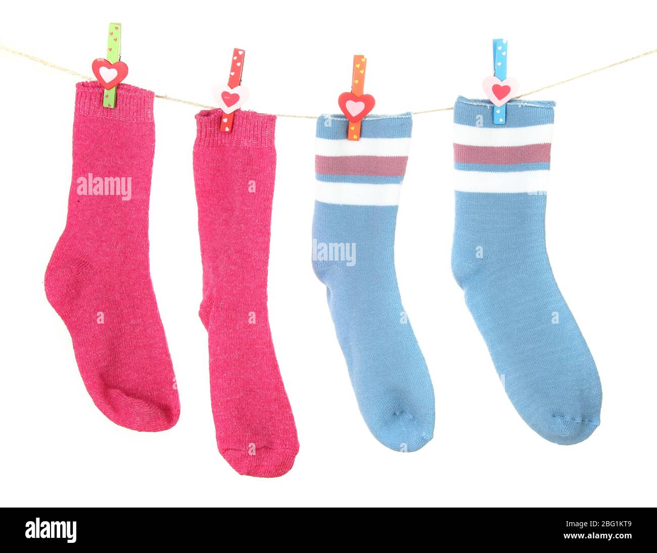Colorful socks hanging on clothesline, isolated on white Stock Photo ...