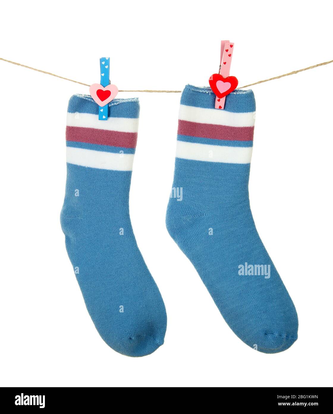Colorful socks hanging on clothesline, isolated on white Stock Photo ...