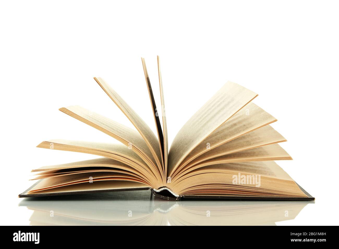 Opened book isolated on white Stock Photo - Alamy