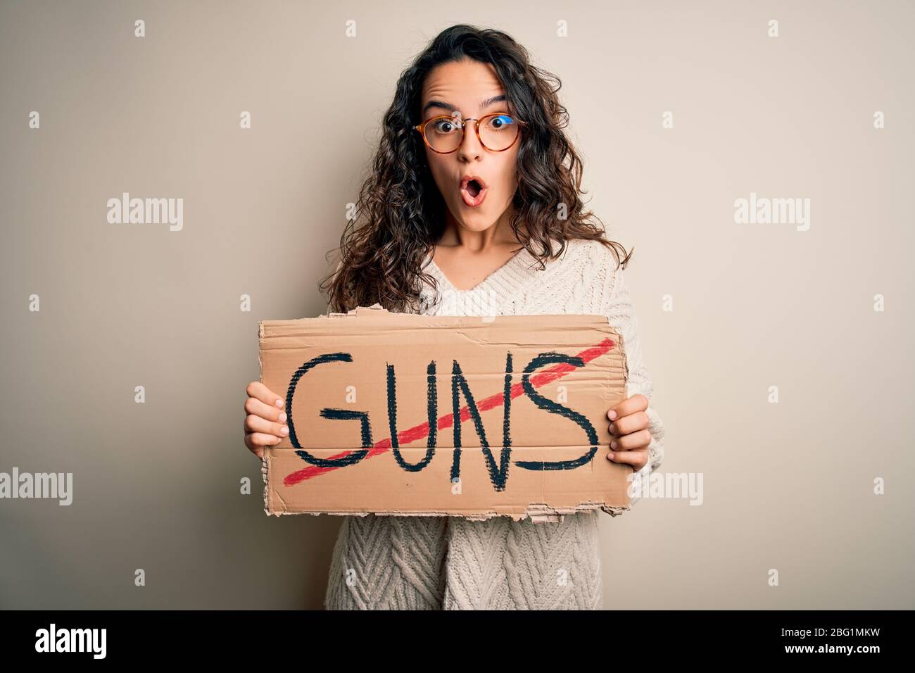 Woman gun fear eyes hi-res stock photography and images - Alamy
