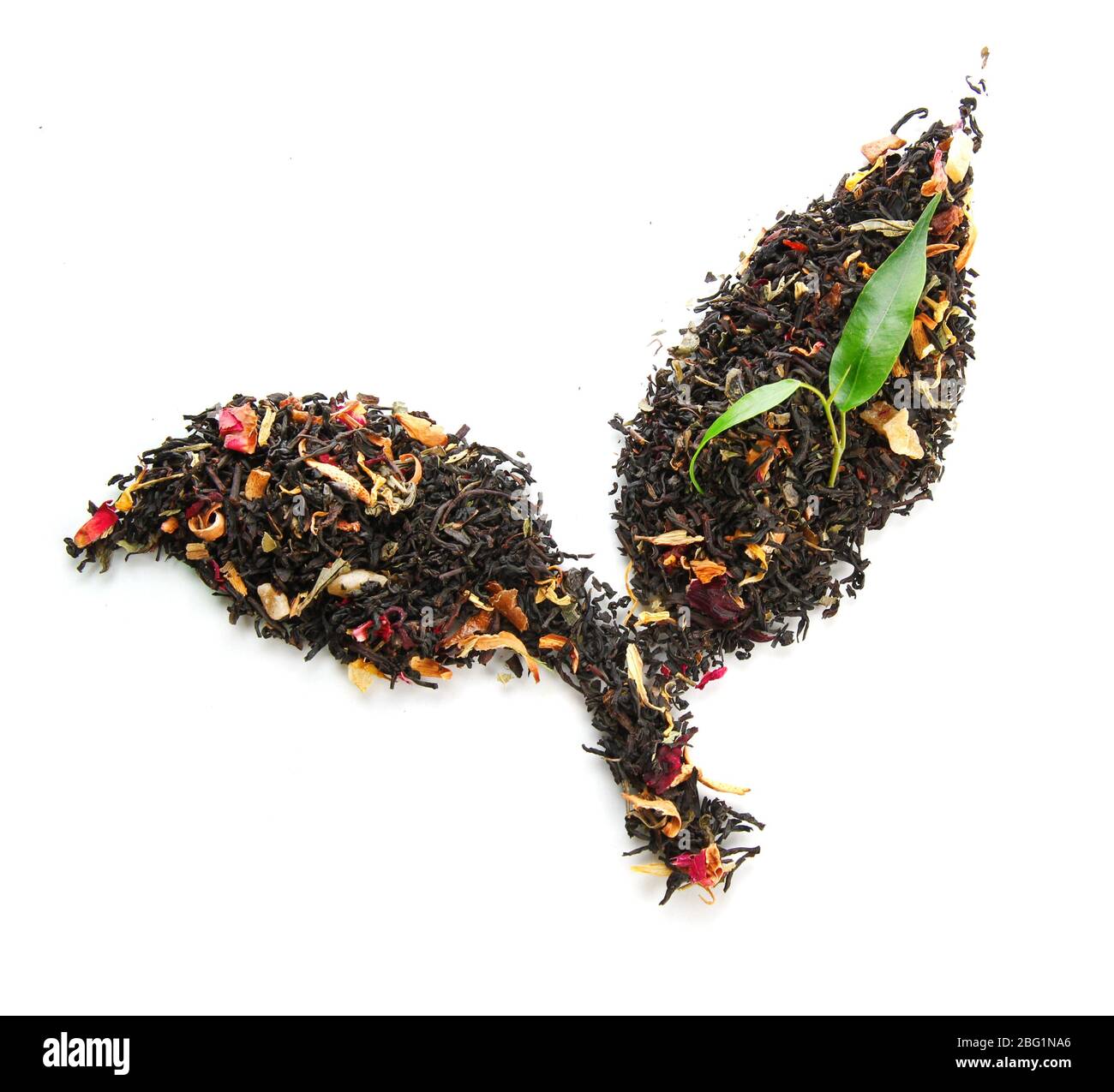 Dry black tea with green leaves, isolated on white Stock Photo - Alamy