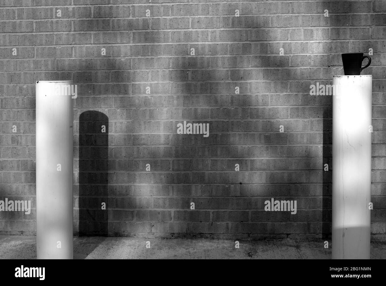 Coffee cup on bollard, Gosforth, Tyne and Wear Stock Photo - Alamy