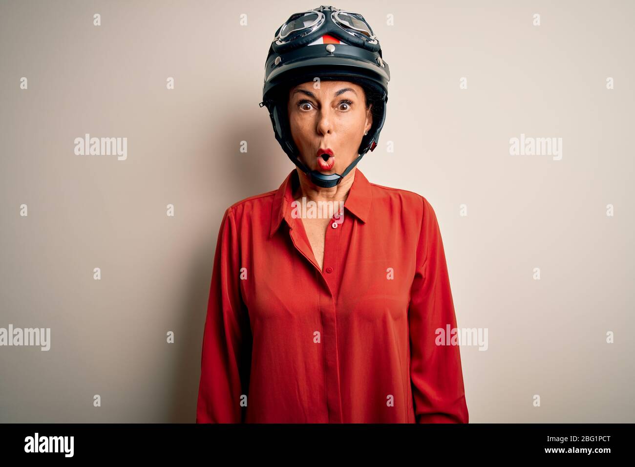 Old woman wearing helmet isolated hi-res stock photography and images ...