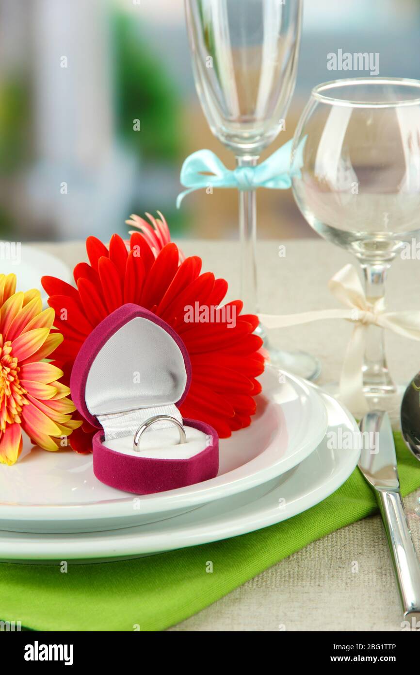 Table serving on bright background Stock Photo - Alamy