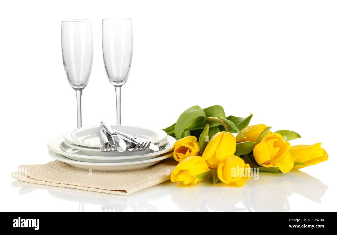 Yellow tulips and utensils for serving isolated on white Stock Photo ...