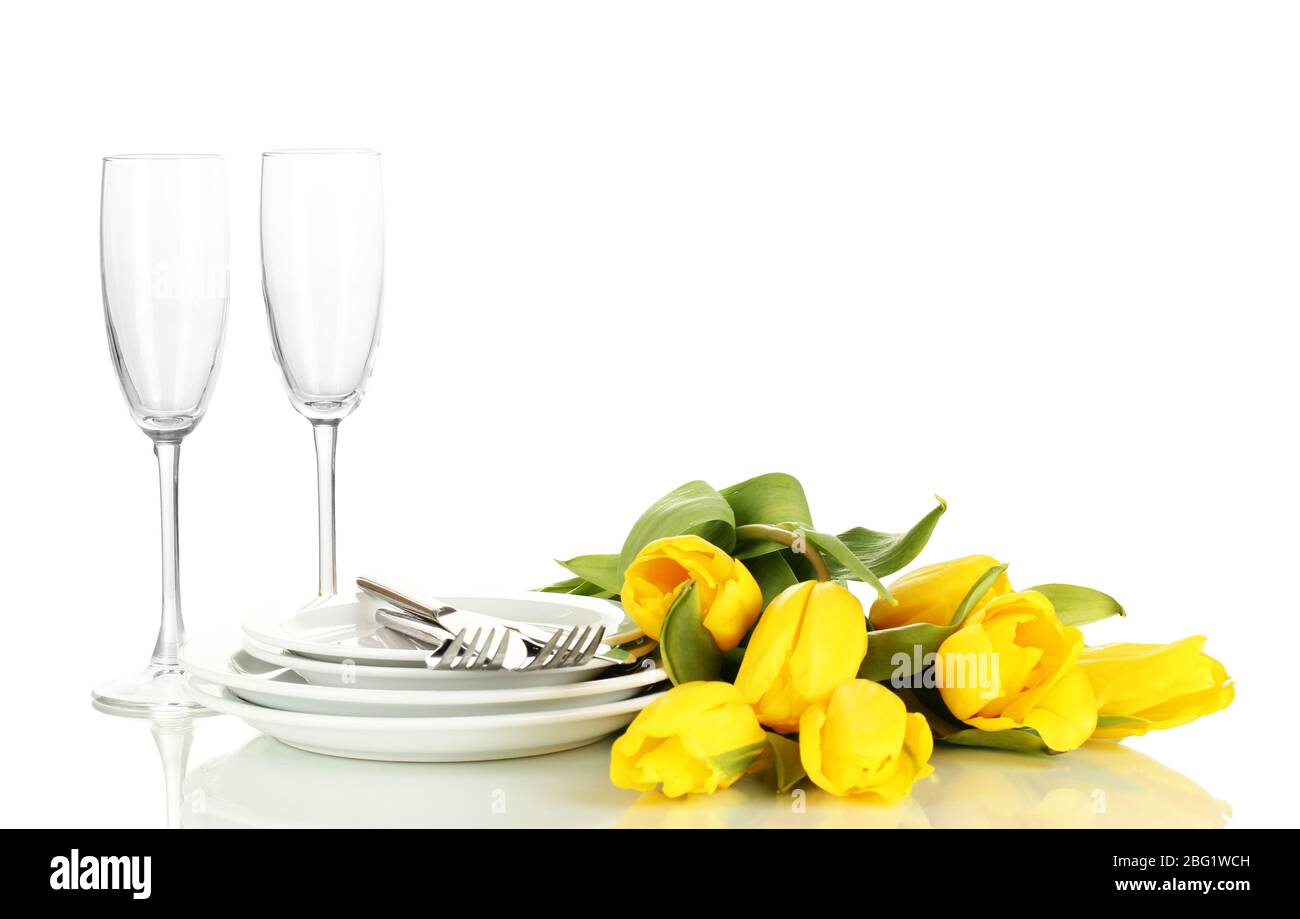 Yellow tulips and utensils for serving isolated on white Stock Photo ...
