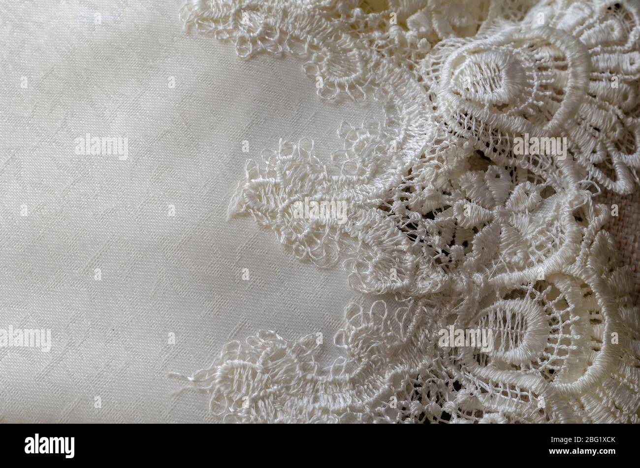 White patterned fabric. Detailed shot of a beautiful fabric. Exquisite ...