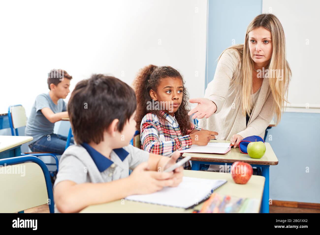 Teacher forbids smartphone use in class and confiscates cellphone from ...