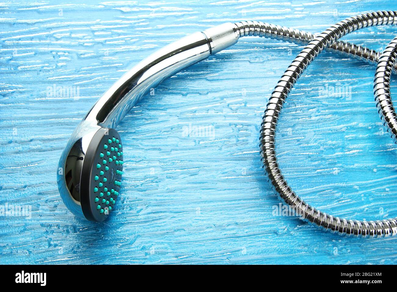 Shower on blue background Stock Photo - Alamy
