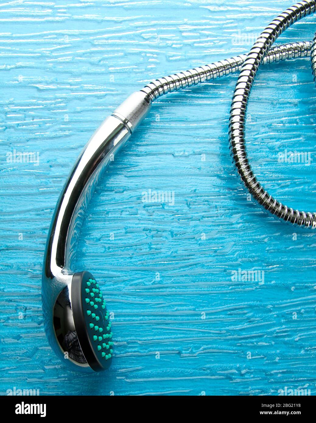 Shower on blue background Stock Photo - Alamy