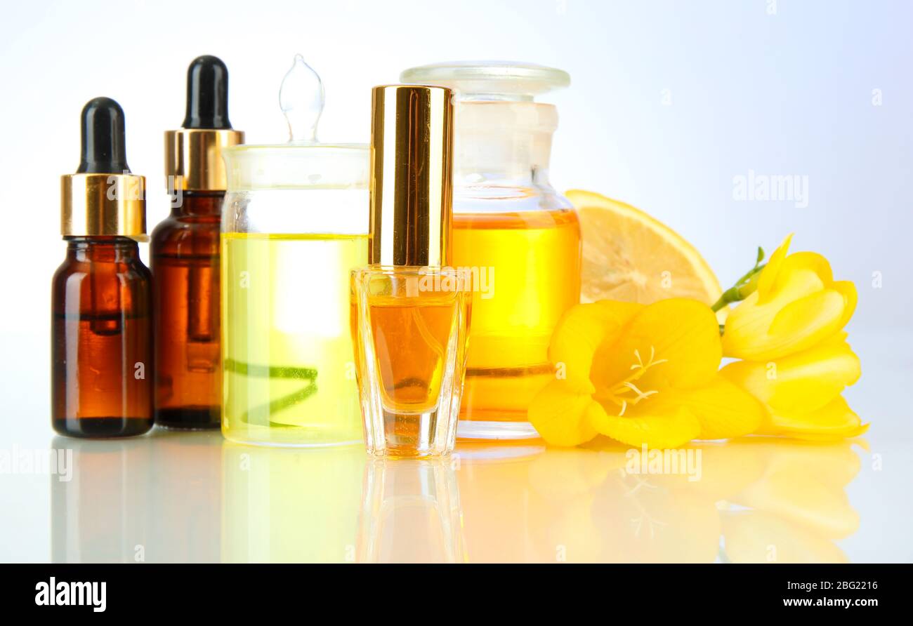 Bottles with ingredients for the perfume, isolated on white Stock Photo ...