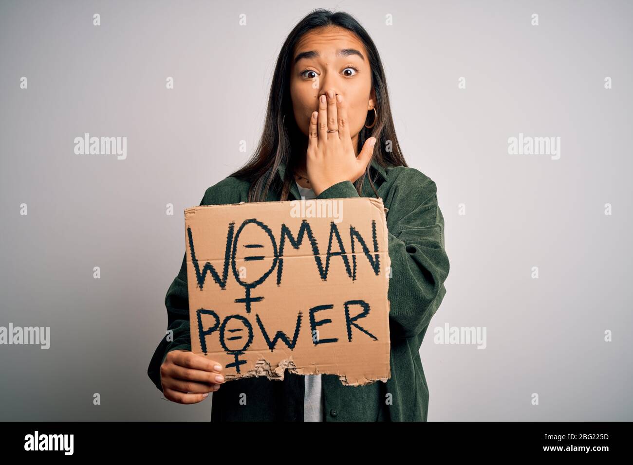 Beautiful activist asian woman asking for women rights holding banner ...