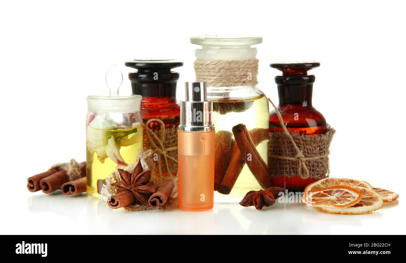 Bottles with ingredients for the perfume, isolated on white Stock Photo ...