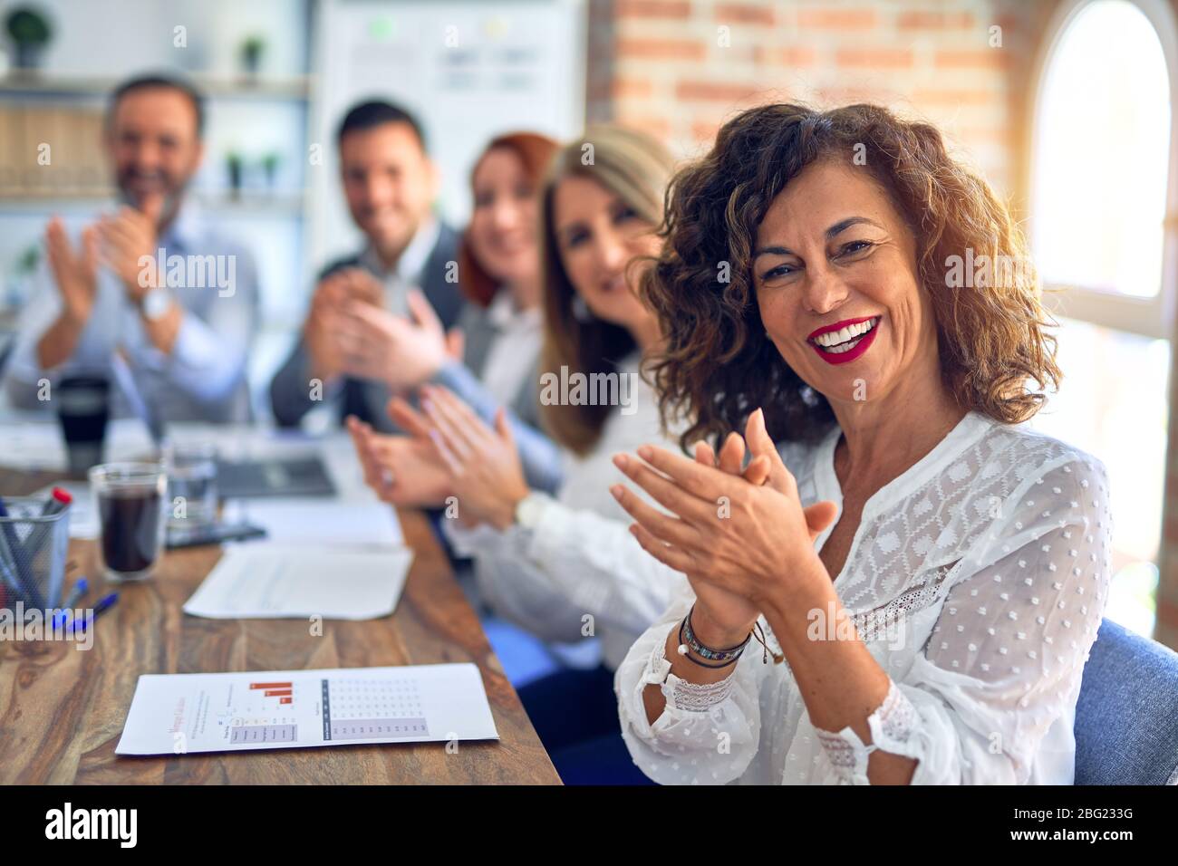 Group of business workers smiling happy and confident. Working together ...