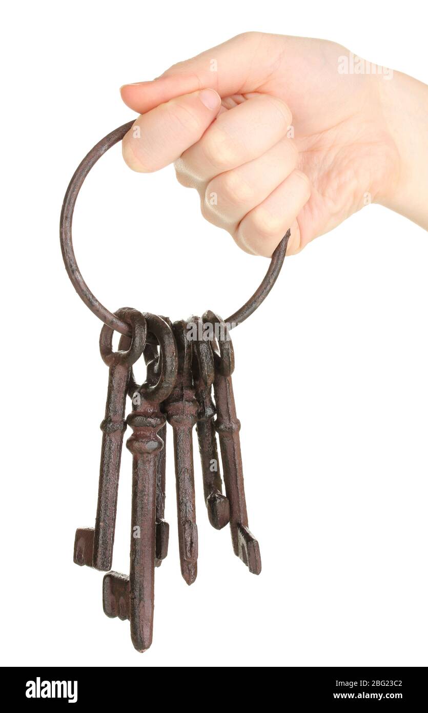 Bunch of old keys in hand isolated on white Stock Photo - Alamy