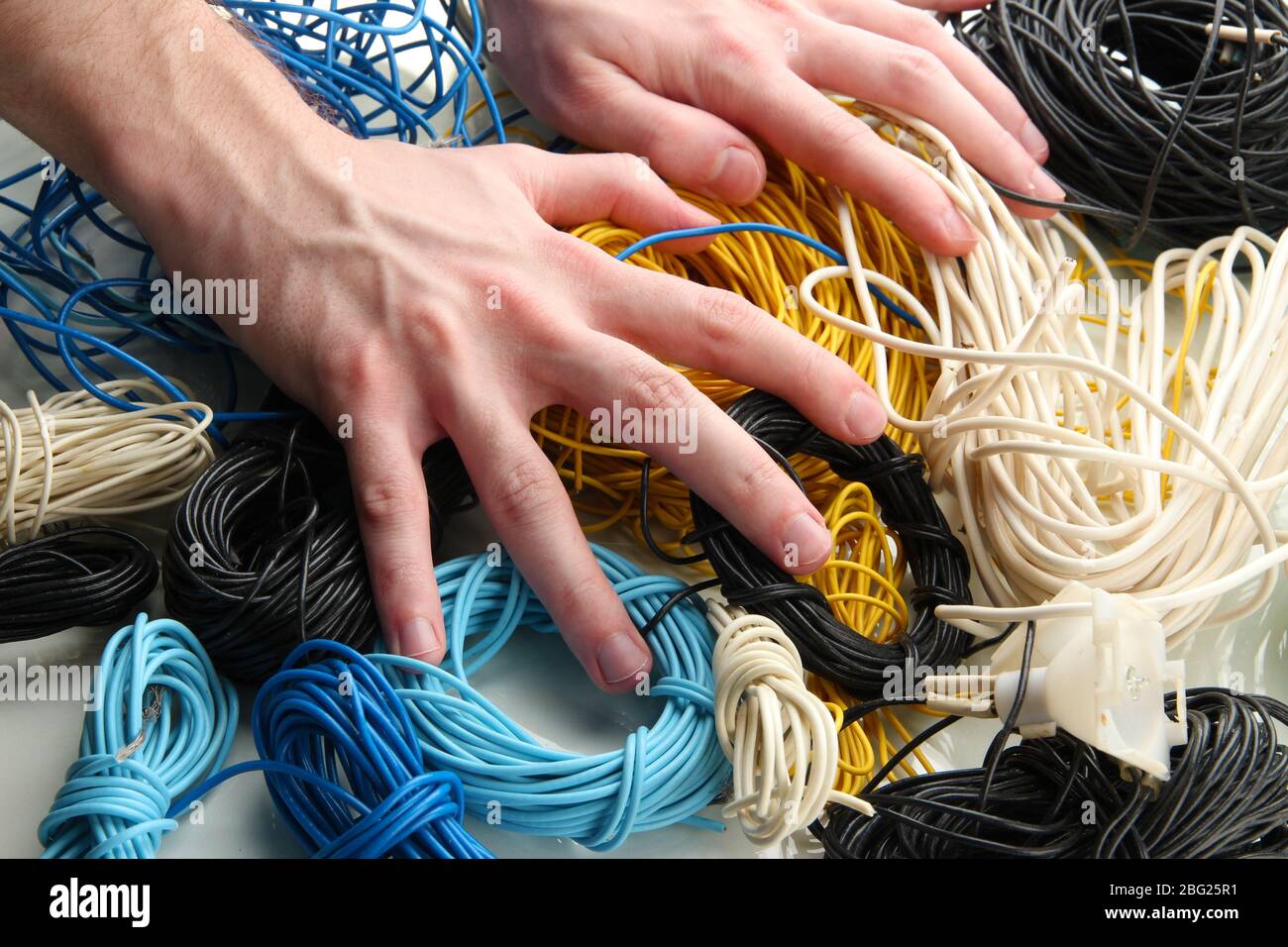 Cables and man hands, close up Stock Photo - Alamy