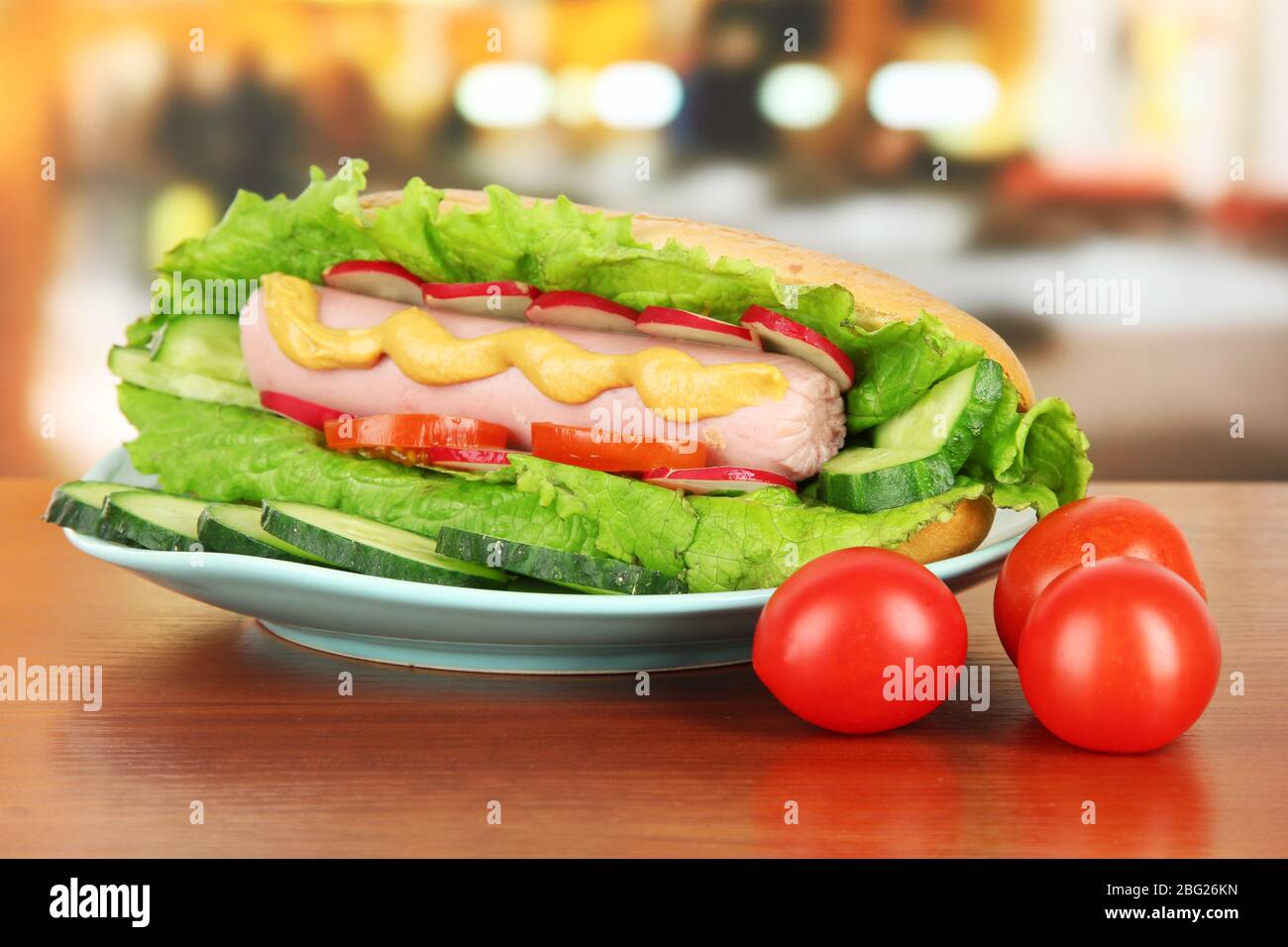 Tasty hot dog on table in cafe Stock Photo - Alamy