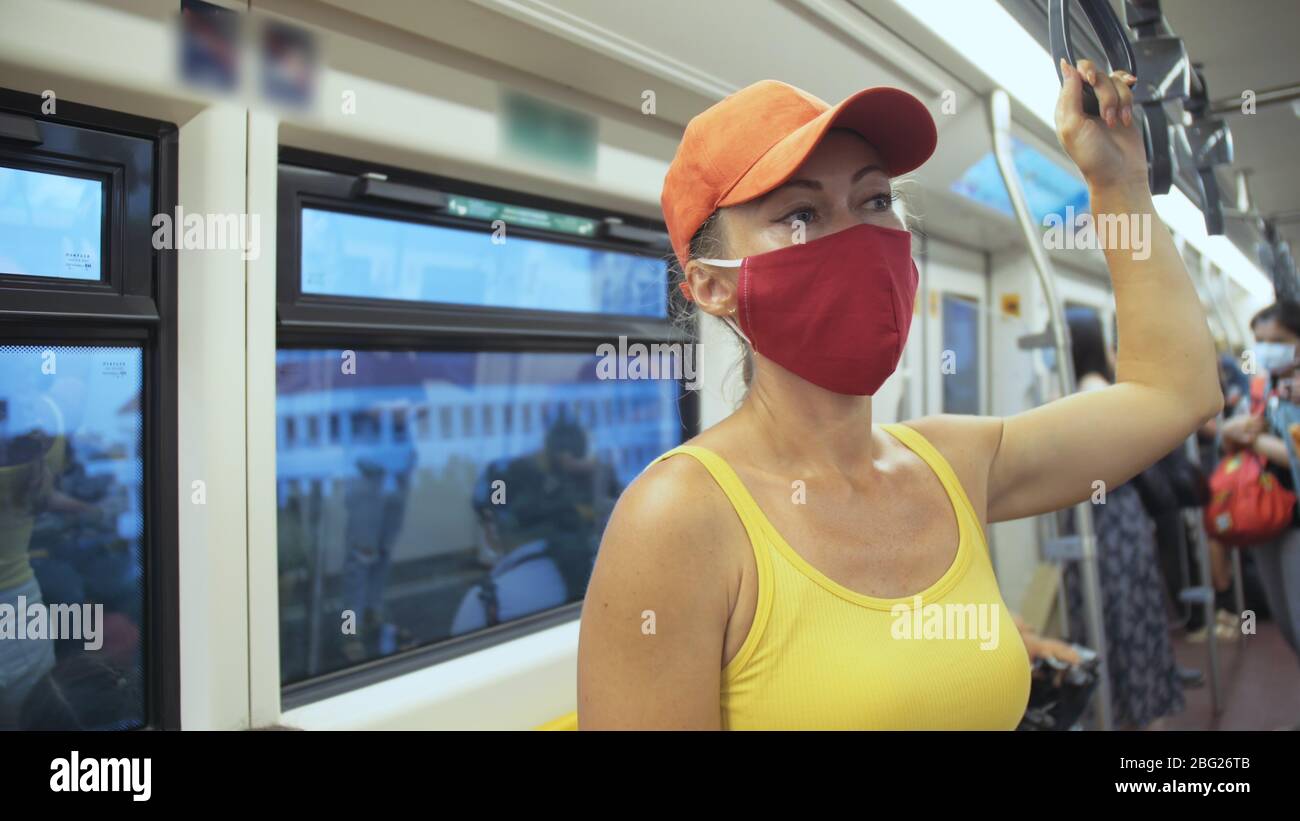 Woman travel caucasian ride at overground train airtrain with wearing ...