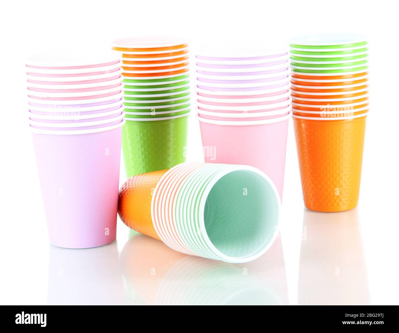 Cups in different color isolated on white Stock Photo - Alamy