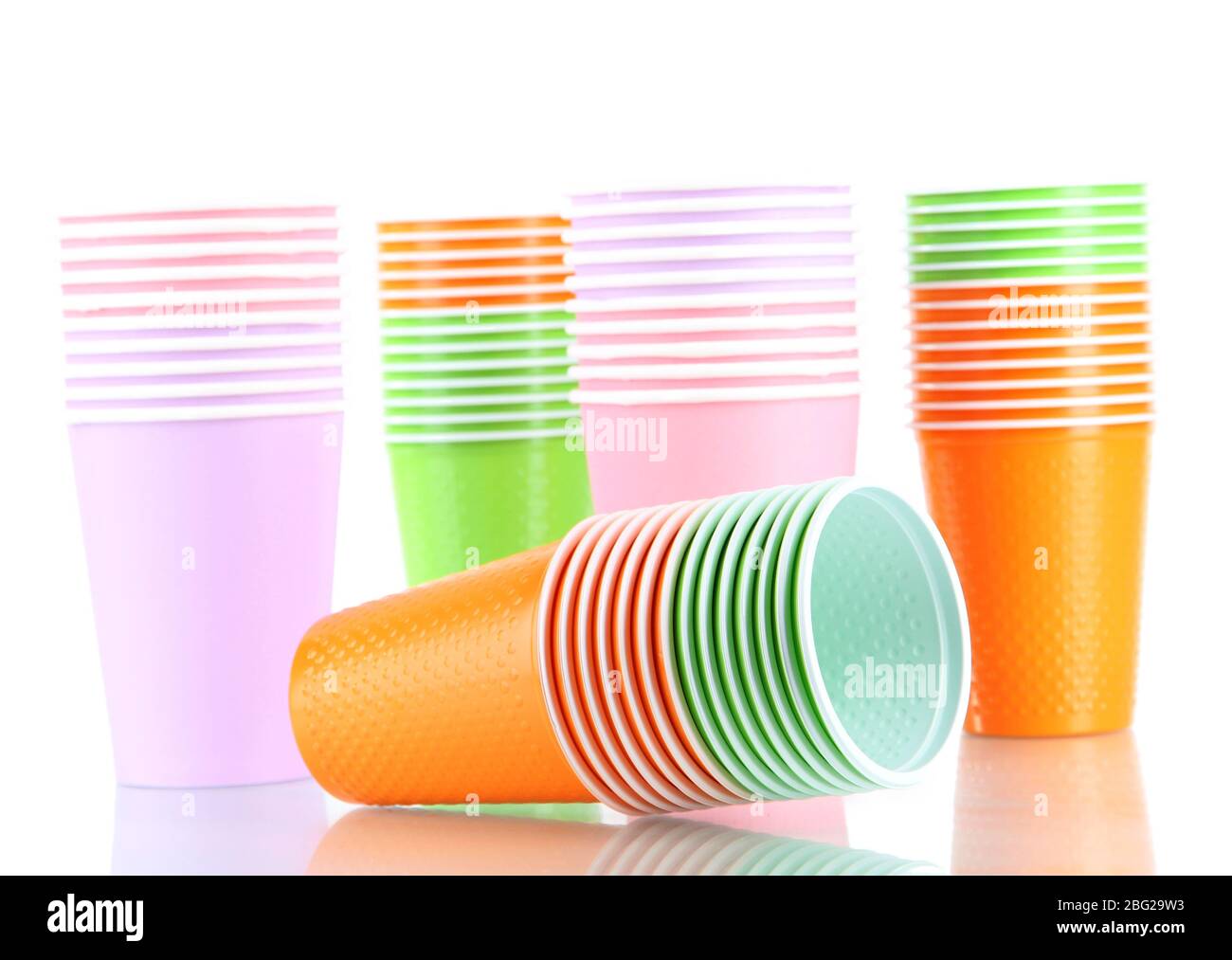 Cups in different color isolated on white Stock Photo - Alamy