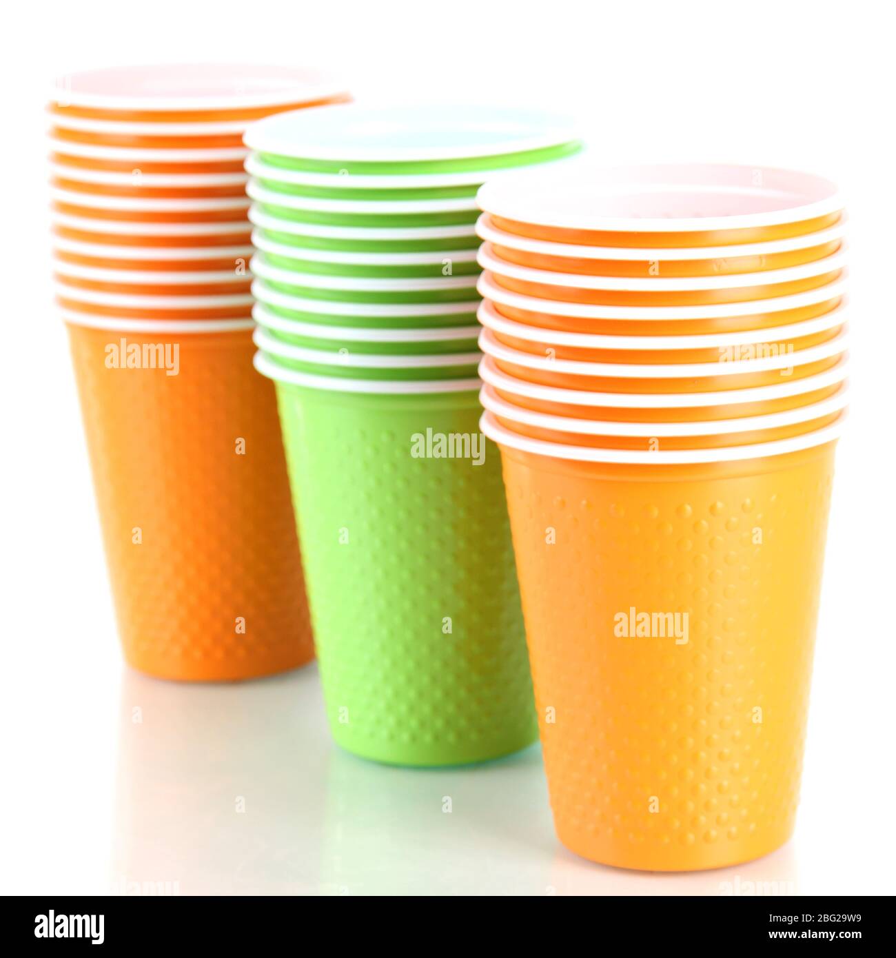 Cups in different color isolated on white Stock Photo - Alamy