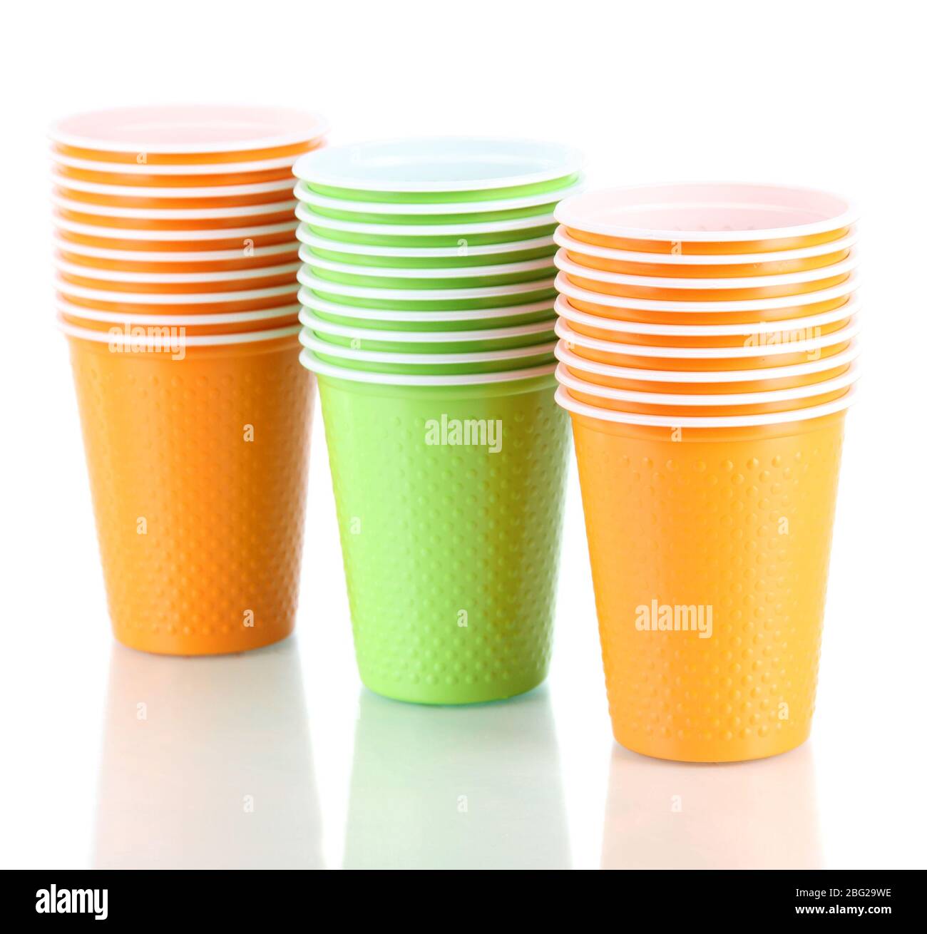 Cups in different color isolated on white Stock Photo - Alamy