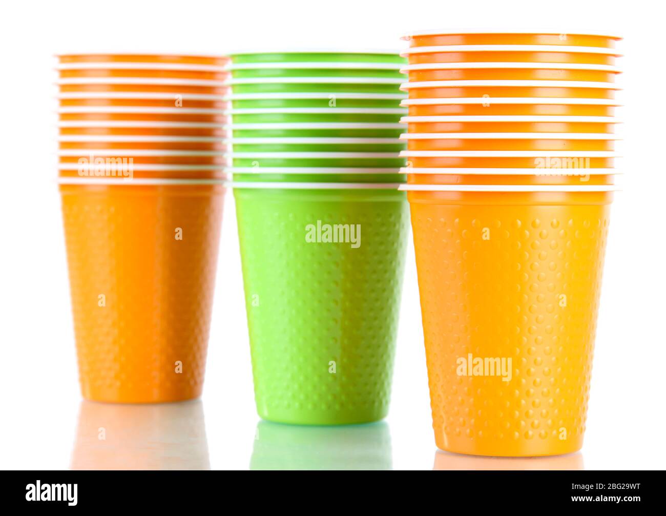 Cups in different color isolated on white Stock Photo - Alamy
