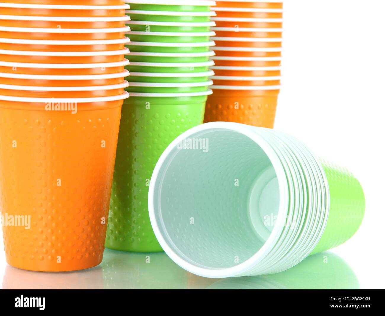 Cups in different color isolated on white Stock Photo - Alamy