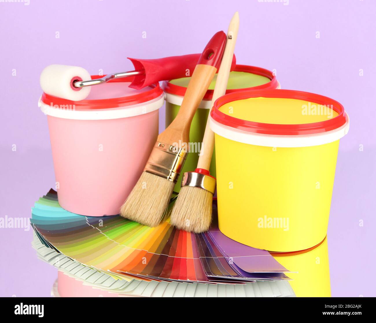 Set for painting: paint pots, brushes, paint-roller, palette of colors ...