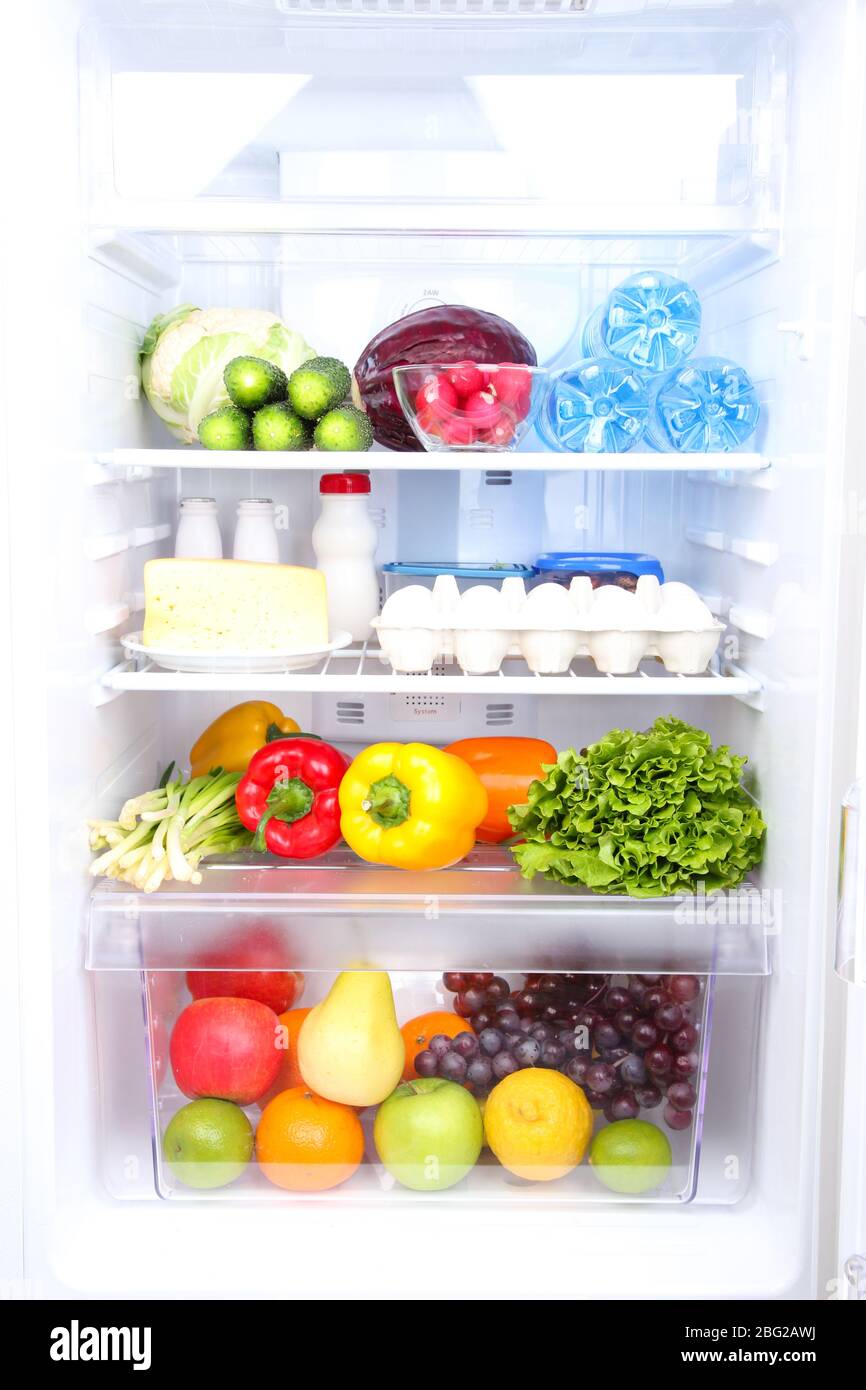 Refrigerator full of food Stock Photo - Alamy