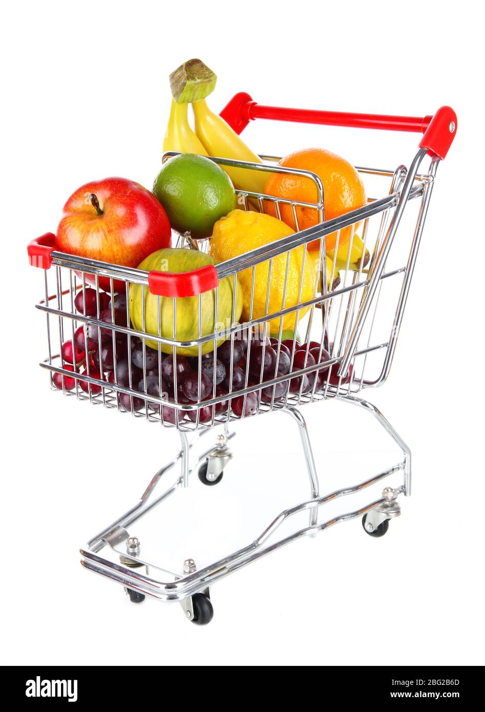 Different fruits in trolley isolated on white Stock Photo - Alamy