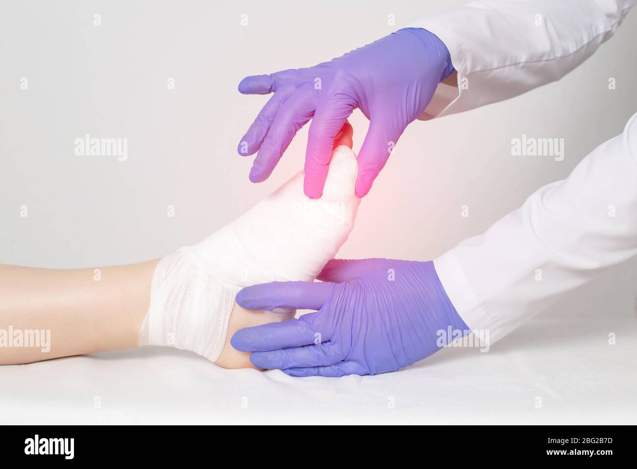 The doctor examines the little finger on the toe. The concept of ...