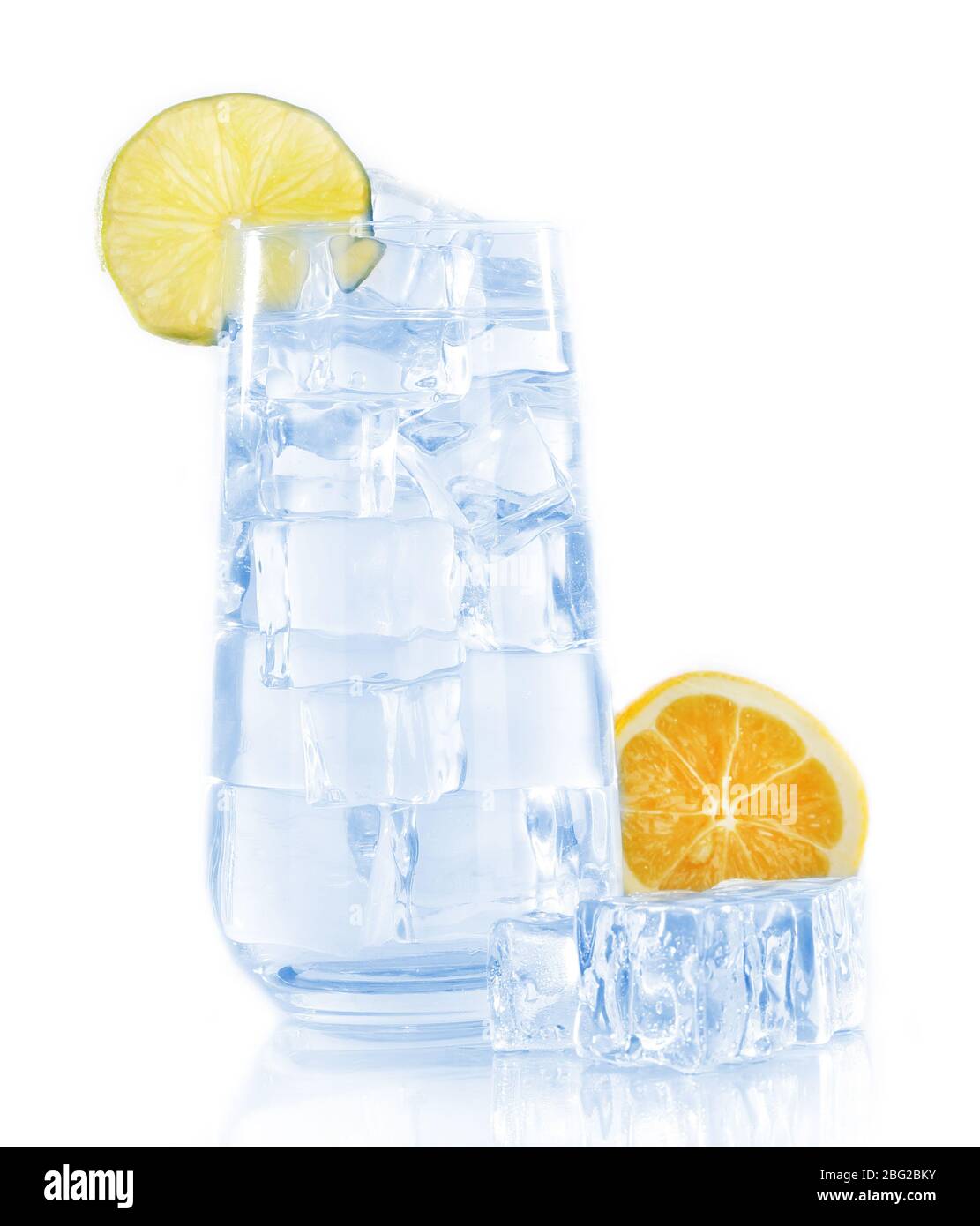 Ice in a glass isolated on white Stock Photo - Alamy