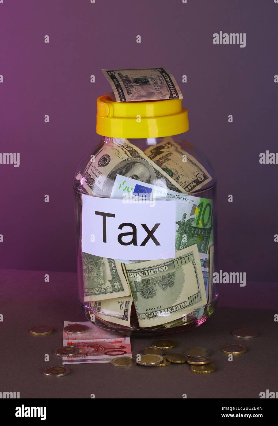 Money in the bank on a gray background Stock Photo - Alamy