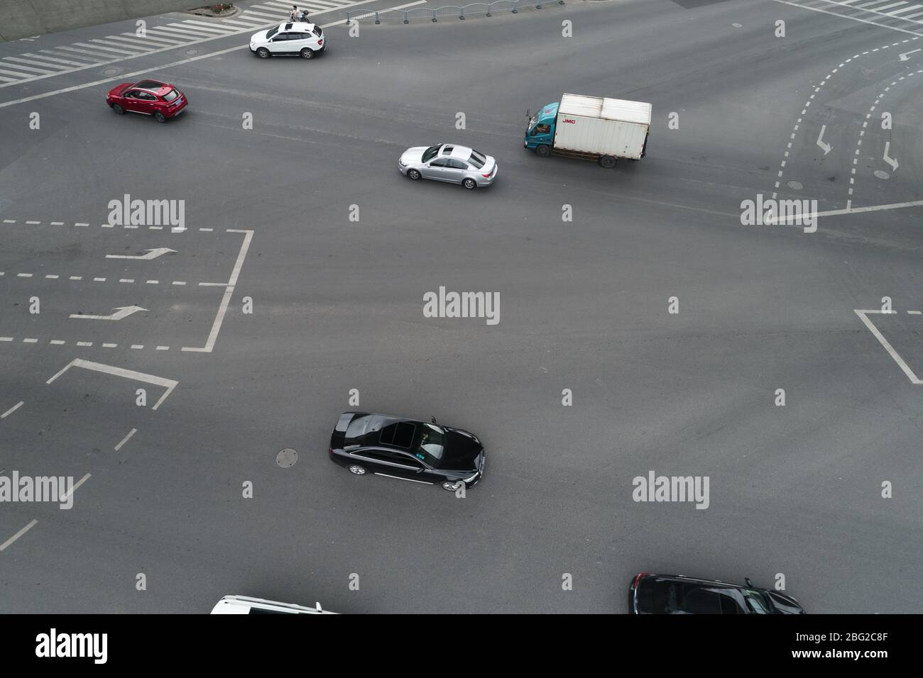 Aerial view on busy traffic intersection Stock Photo - Alamy