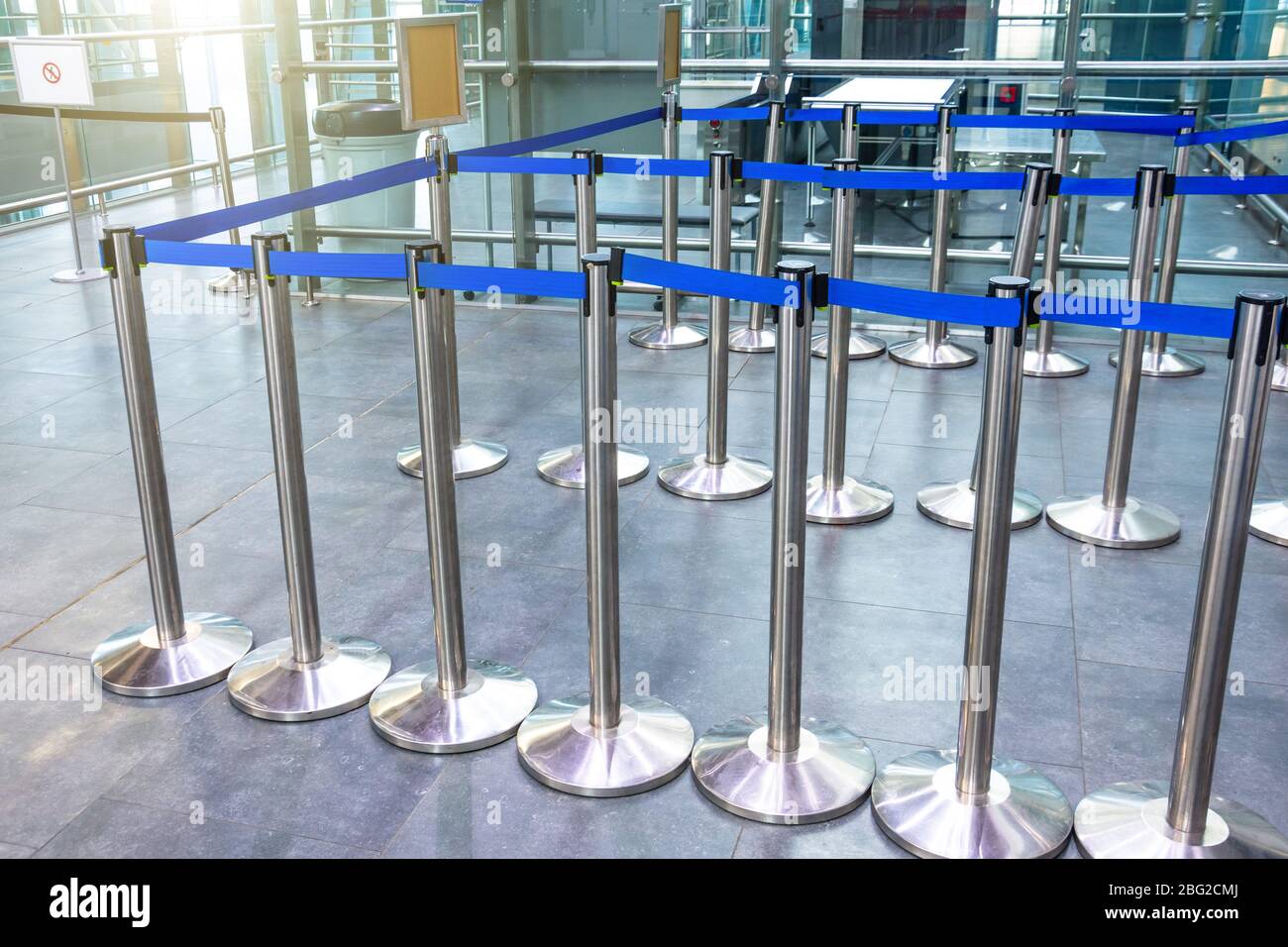 Blue tape portable barrier indoor inside a building Stock Photo - Alamy