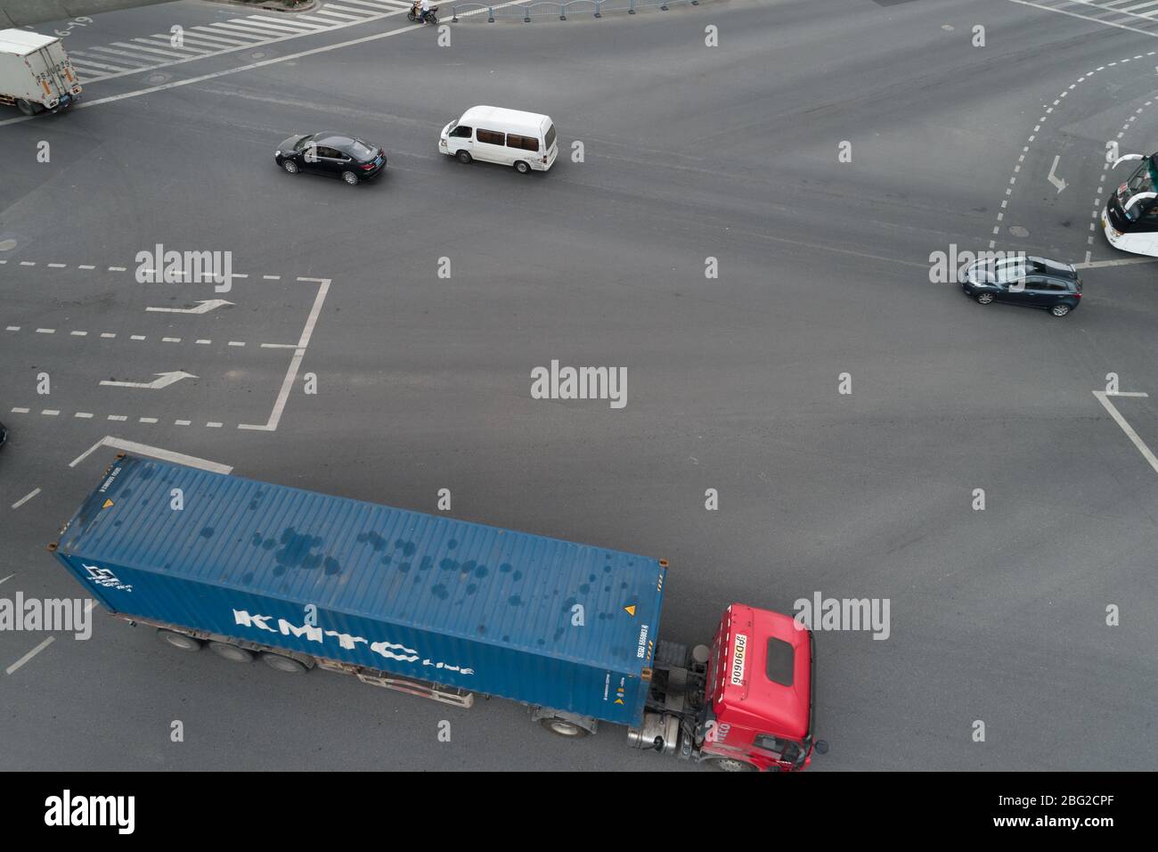 Aerial view on busy traffic intersection Stock Photo - Alamy