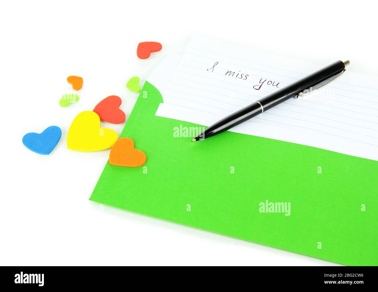 Note in envelope with pen isolated on white Stock Photo - Alamy