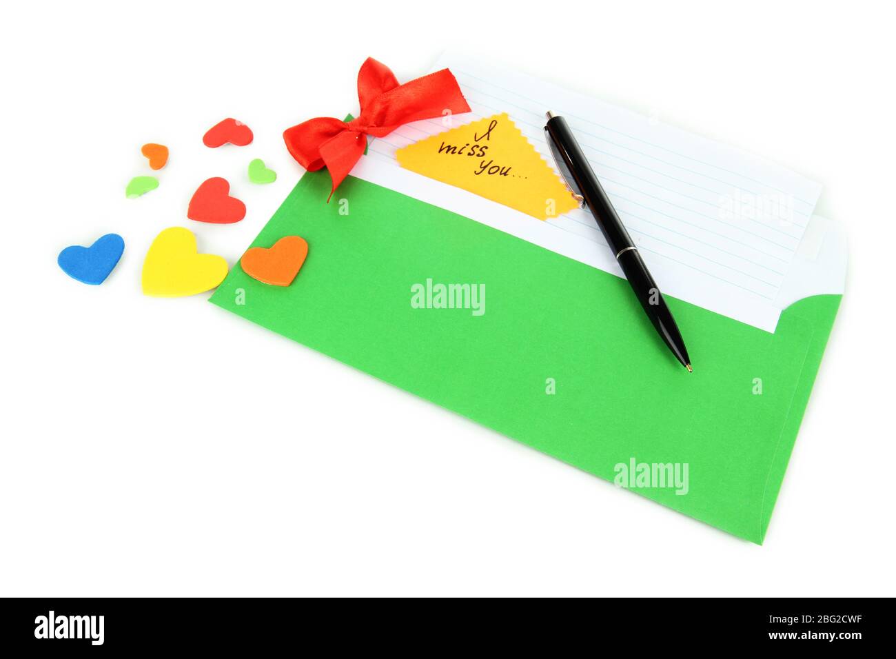 Note in envelope with pen isolated on white Stock Photo - Alamy