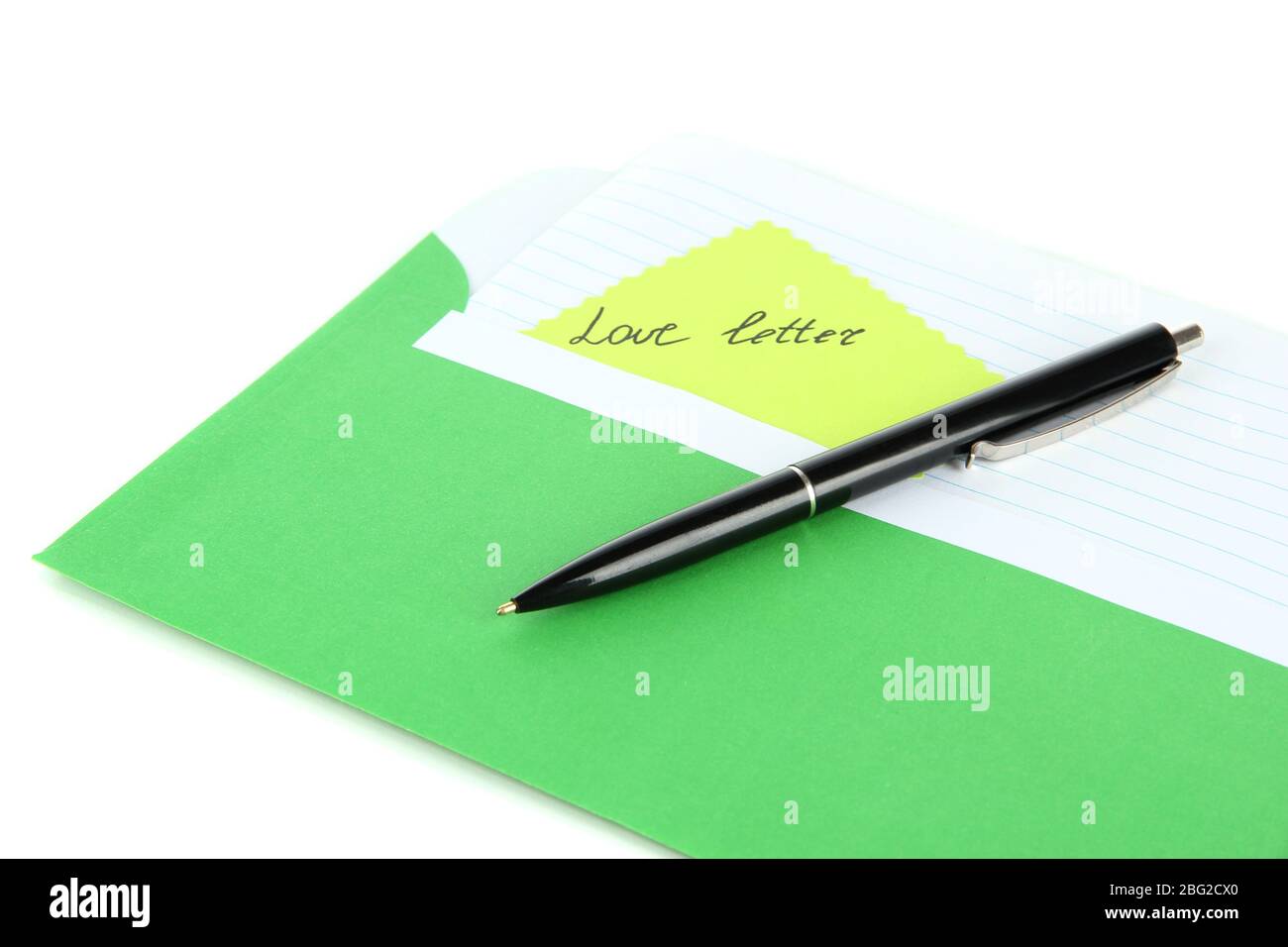 Note in envelope with pen isolated on white Stock Photo - Alamy