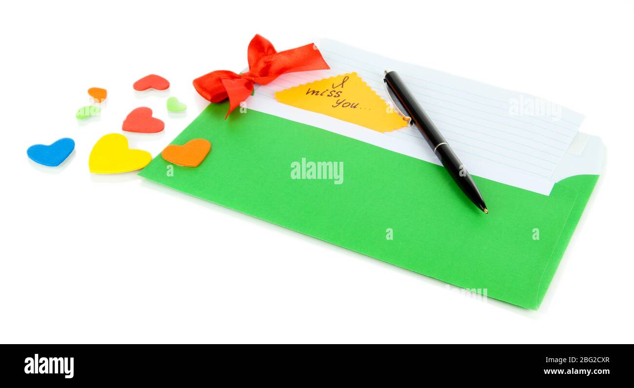 Note in envelope with pen isolated on white Stock Photo - Alamy