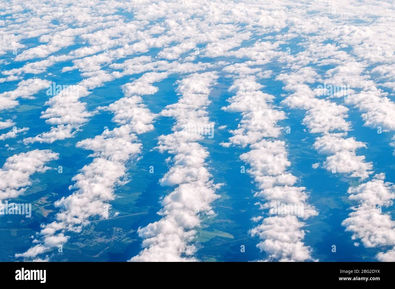 Equal rows of clouds from the height of the atmosphere Stock Photo - Alamy
