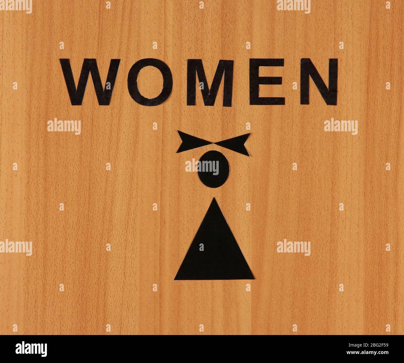 Toilet sign on wooden background Stock Photo - Alamy
