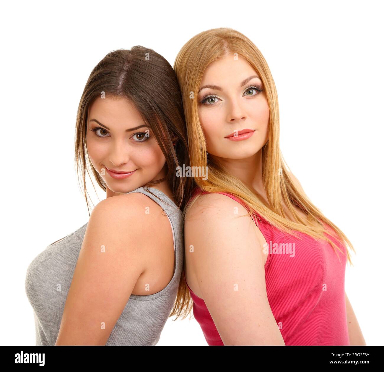 Two girl friends hugging isolated on white Stock Photo - Alamy