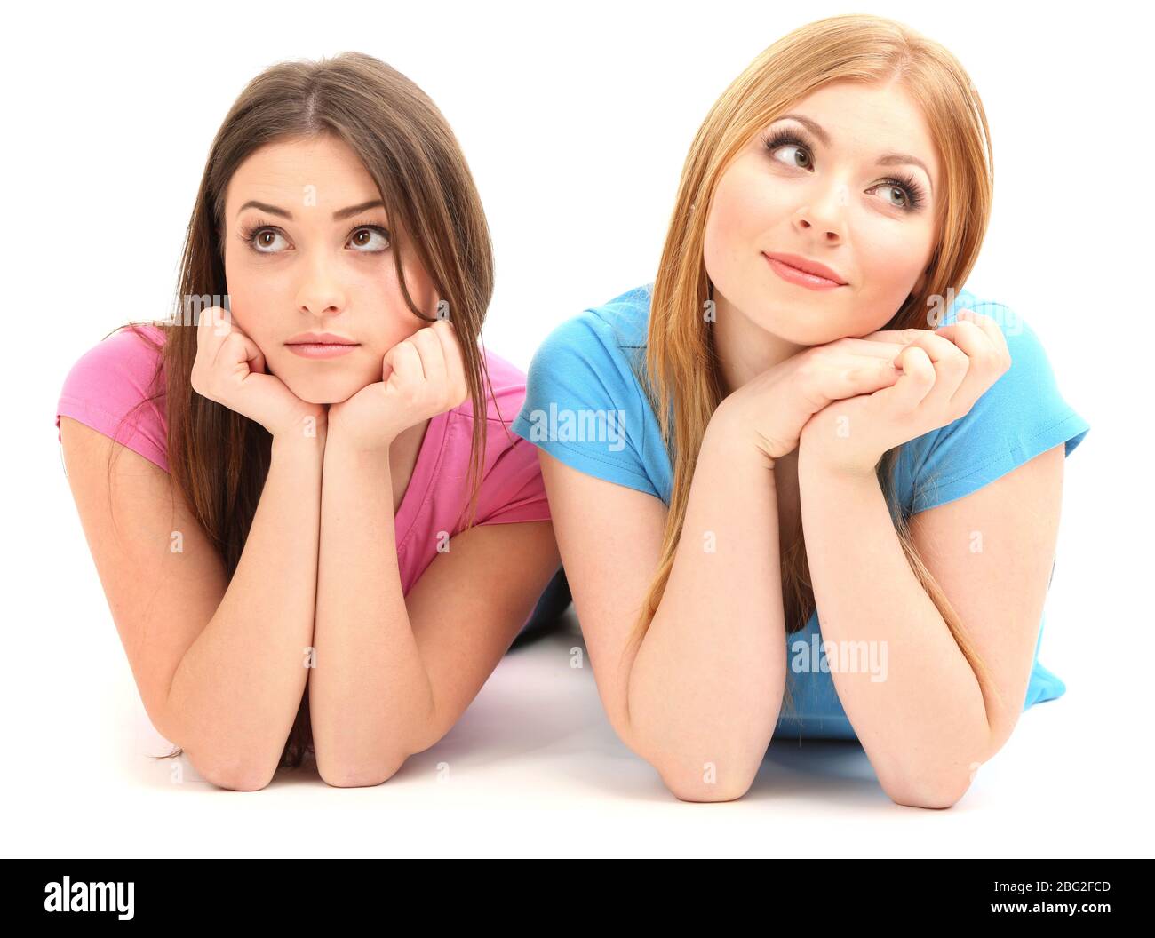 Two girl friends isolated on white Stock Photo - Alamy