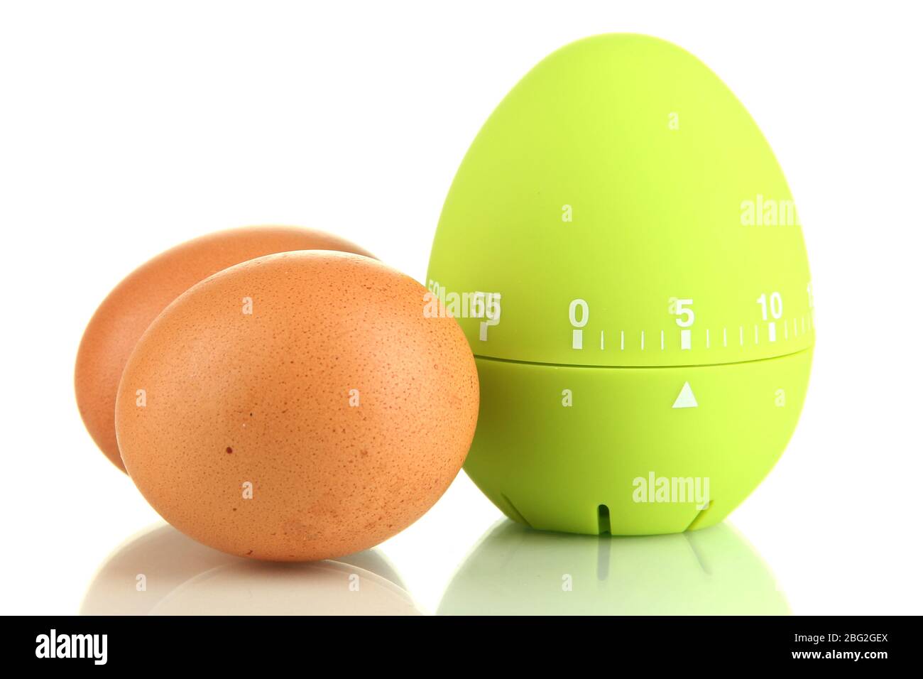 Green egg timer and eggs, isolated on white Stock Photo - Alamy