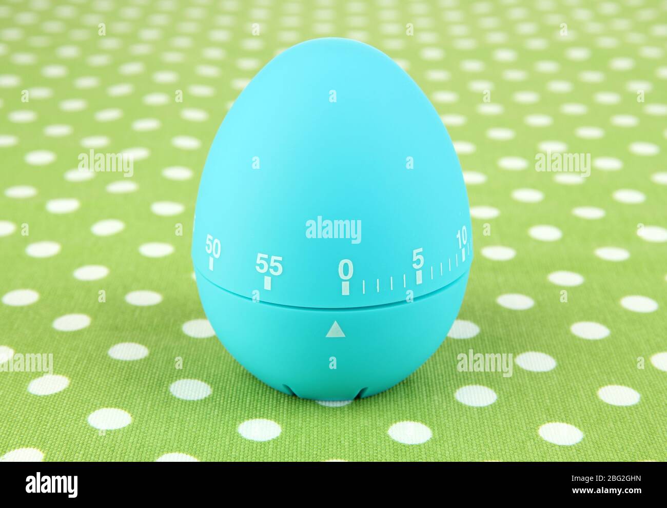 Blue egg timer, on color background Stock Photo - Alamy