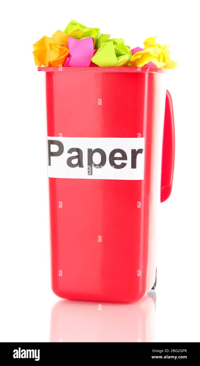 Recycling bin with papers isolated on white Stock Photo - Alamy