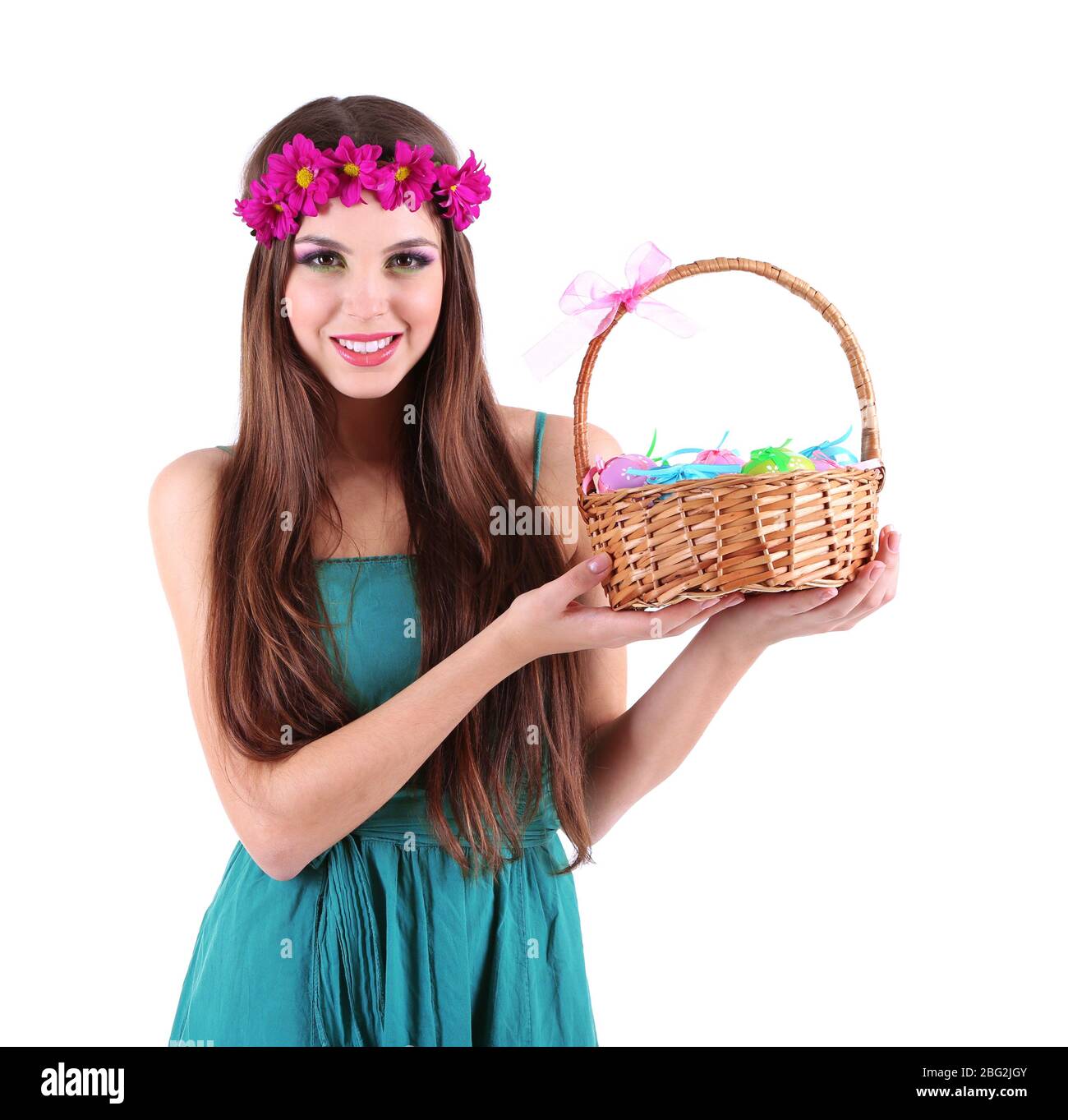 Happy female holding basket with Easter eggs, isolated on white Stock ...