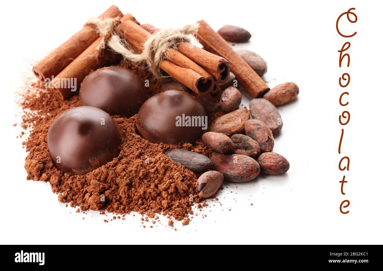 Composition of chocolate sweets, cocoa and spices, isolated on white ...